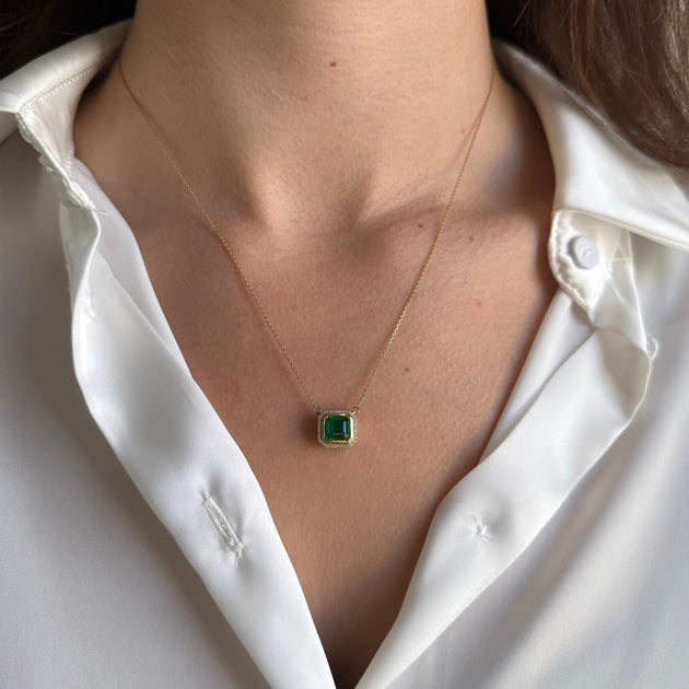 Emerald and Diamond Halo Pendant Necklace in 18K Yellow Gold – Jahan Diamond Imports